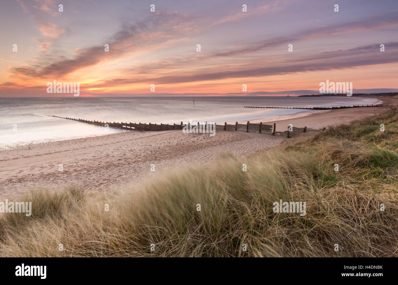 Blyth beach from the sand dunces above the wooden groynes stretching ...