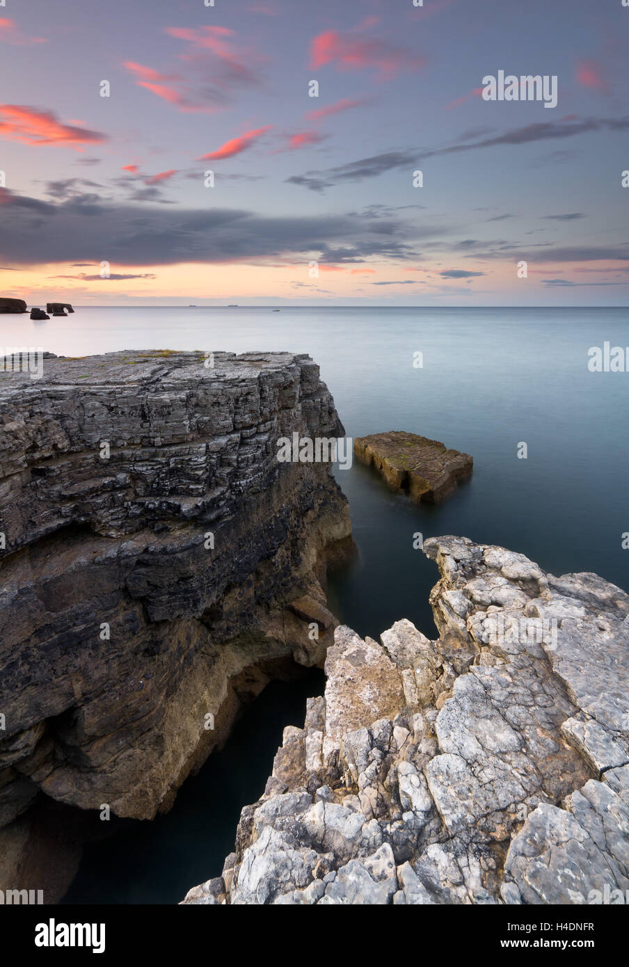 Sudden drop off sea cliffs, vertigo, precipitous drop into the North ...