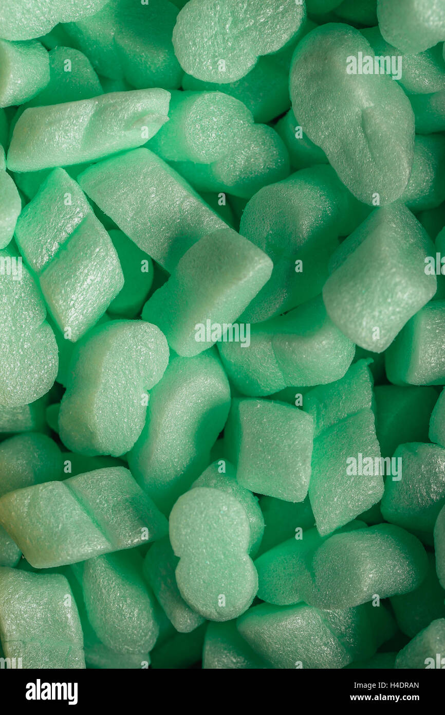 pieces of green styrofoam in carton box background Stock Photo - Alamy