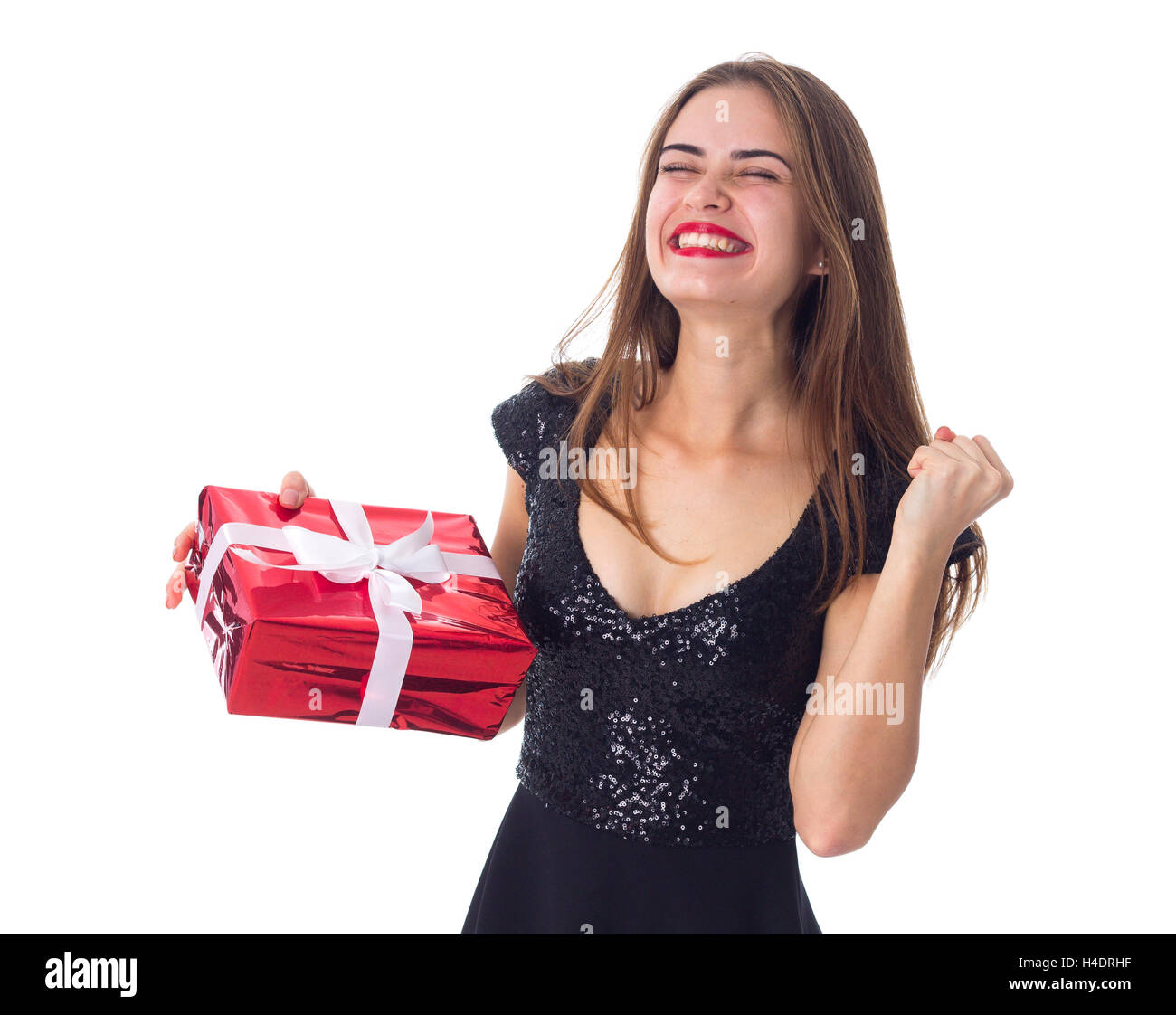 Young woman holding a present Stock Photo - Alamy