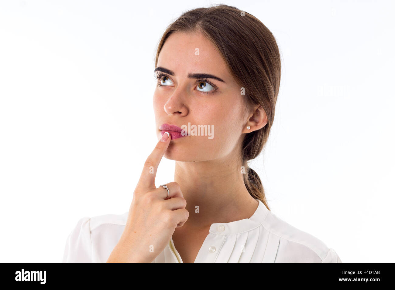 Woman thinking about something Stock Photo - Alamy