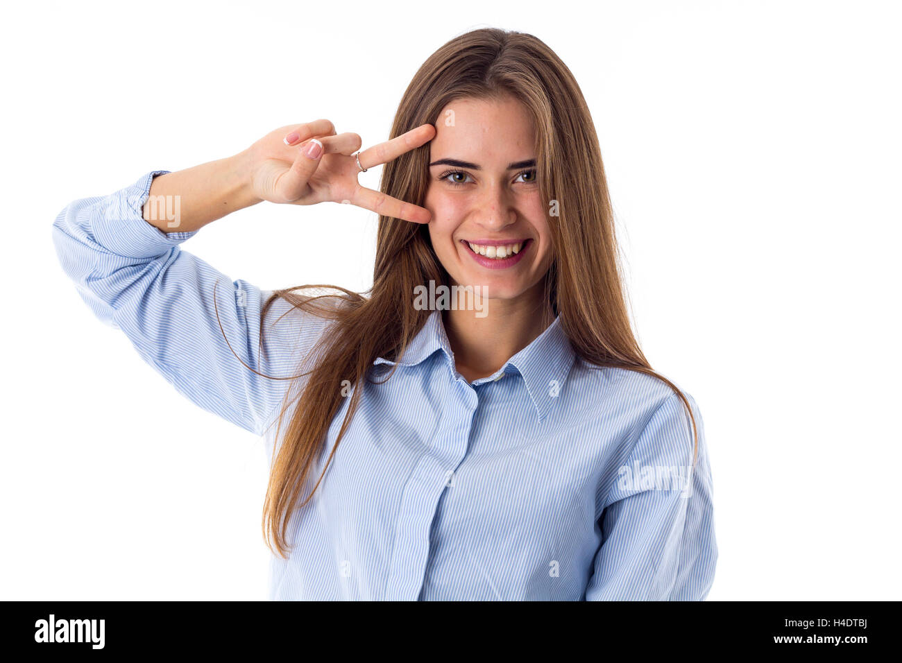 Woman showing peace Stock Photo - Alamy