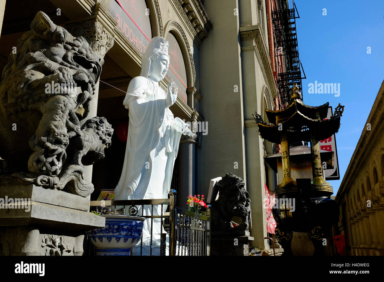 Statues of lions and Goddess of Guan Yin in front of Sung Tak Buddhist ...