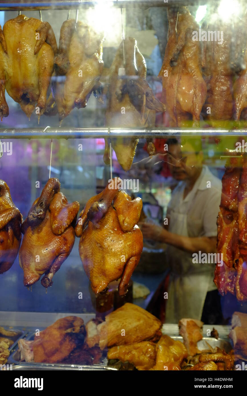 Roasted ducks hanging in window hi-res stock photography and images - Alamy