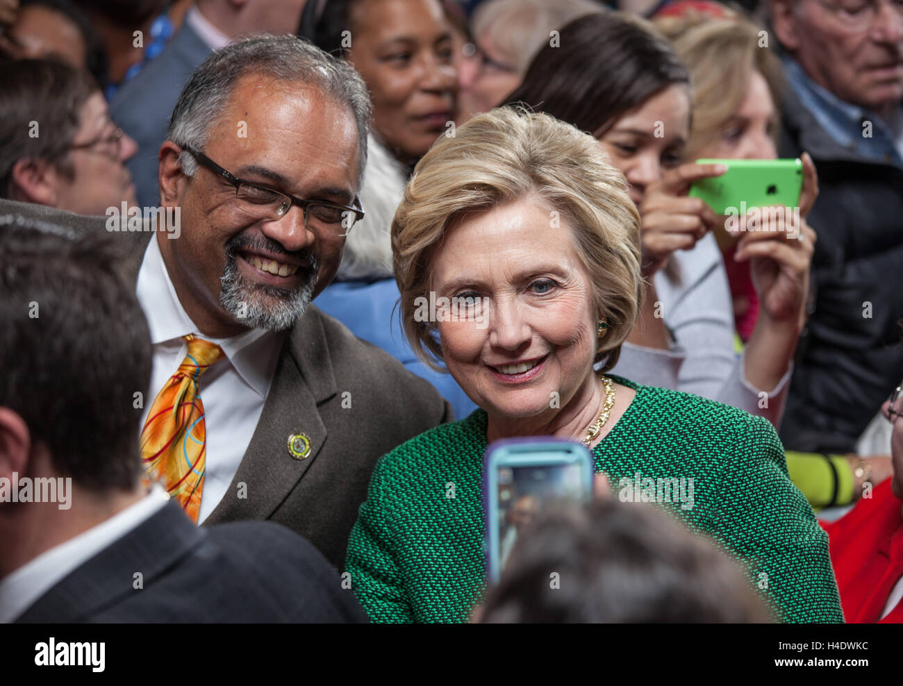 Hillary Clinton taking selfies and photos with supporters at a ...