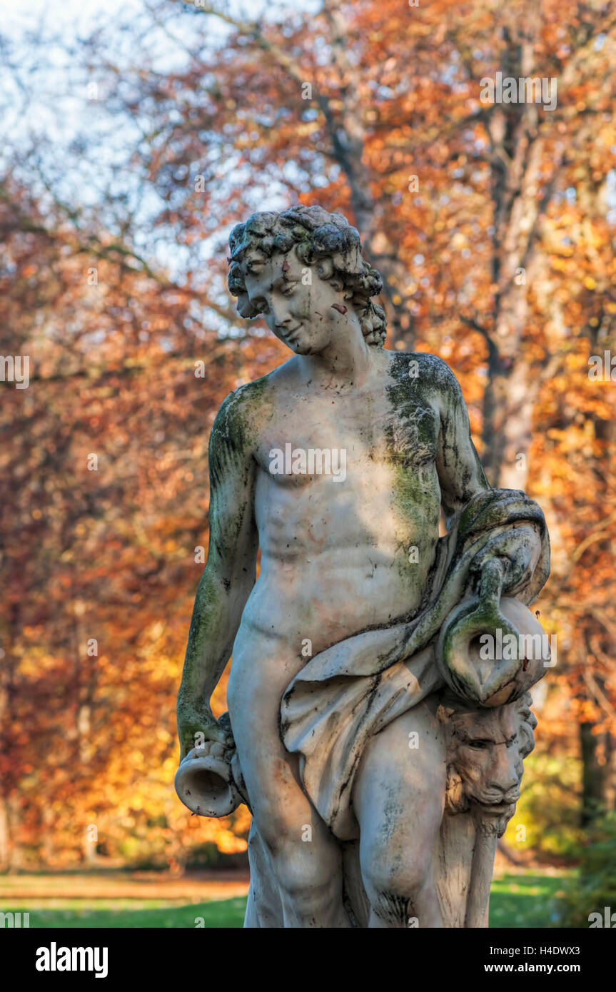 autumnal exterior shot, statue in the back light Stock Photo - Alamy