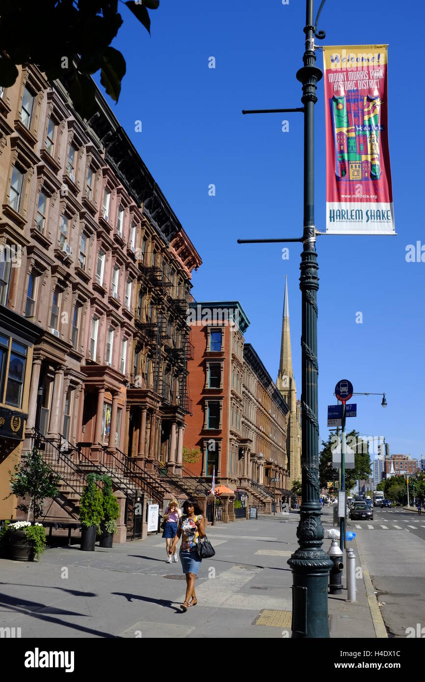 Brownstone apartment building on Lenox Avenue with Ephesus Church of ...