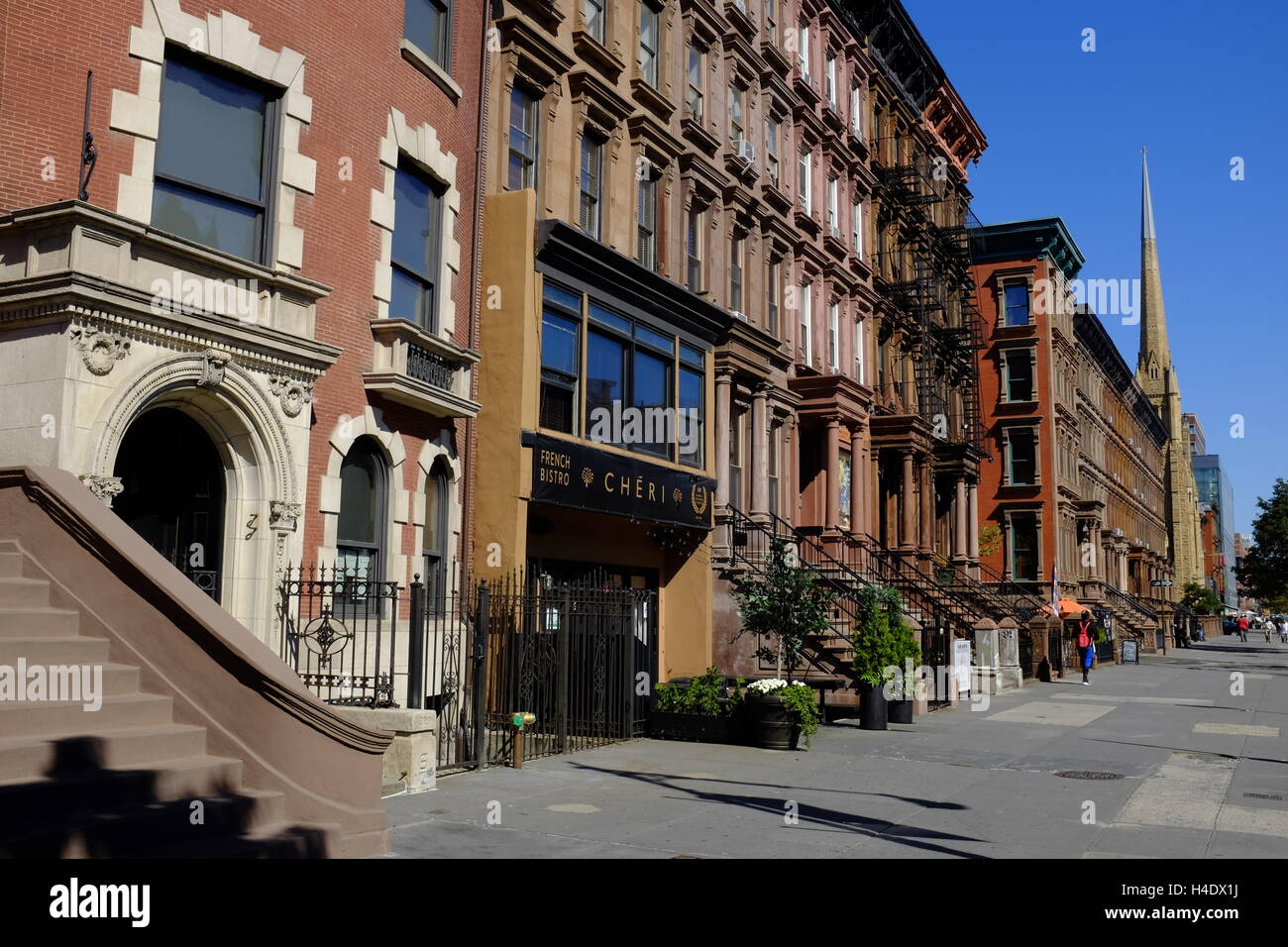 Brownstone apartment building on Lenox Avenue with Ephesus Church of ...