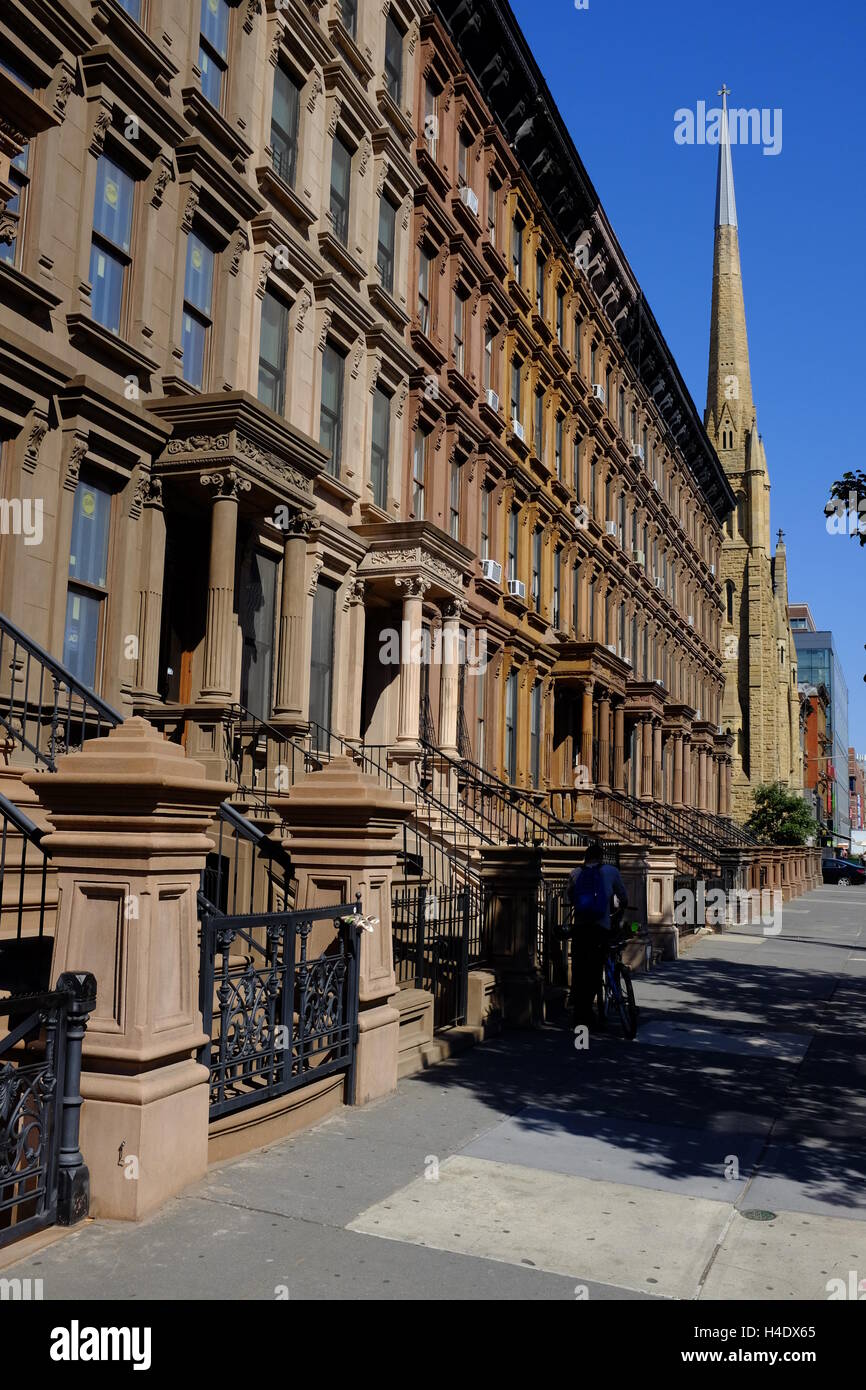 renovated classic brownstone apartment buildings with Ephesus Church of ...