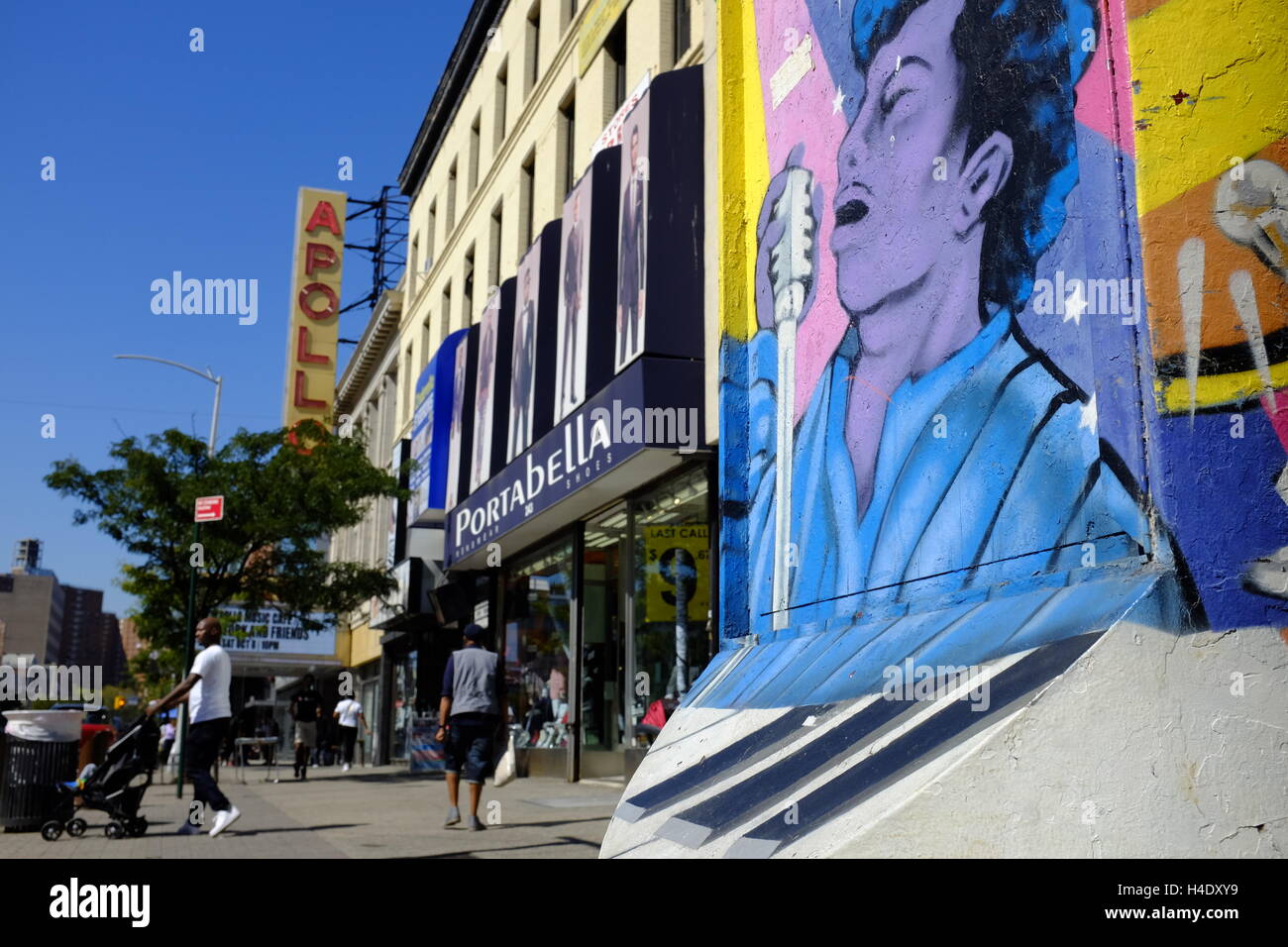 Street mural on 125th street with the sign of Apollo Theater in the ...