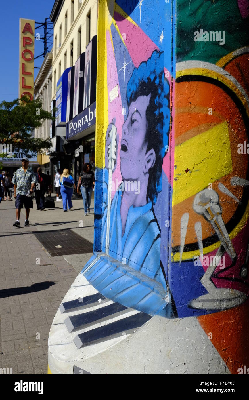 Street mural on 125th street with the sign of Apollo Theater in the ...