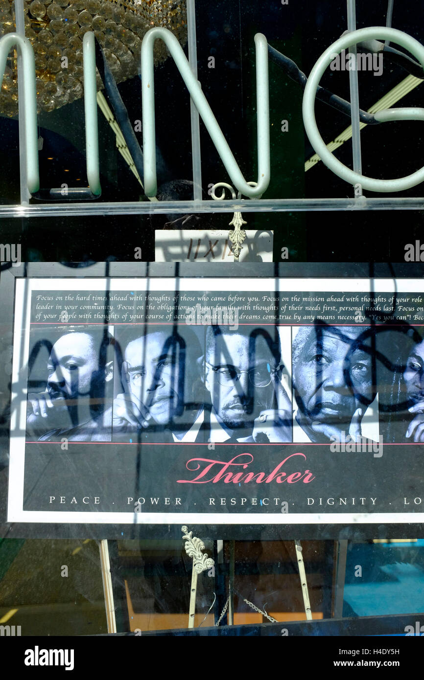 Posters of famous black thinkers display in a store window in Harlem ...