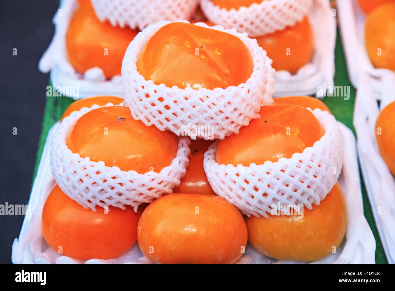 Japanese persimmon fruits, Japn, Tokyo, Ueno, Ameyoko Market Stock ...