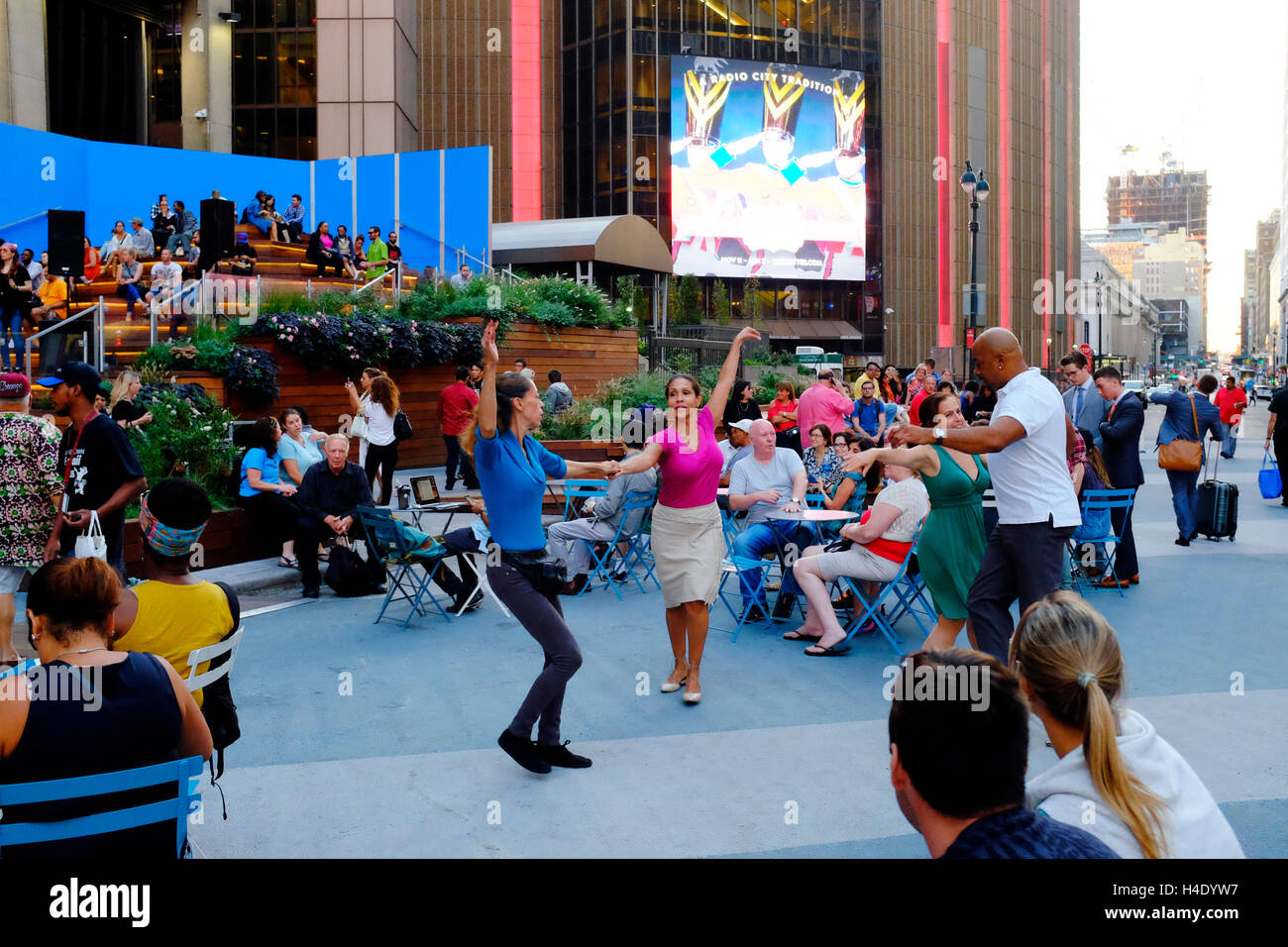 People dancing Salsa on the street next to Madison Square Garden ...