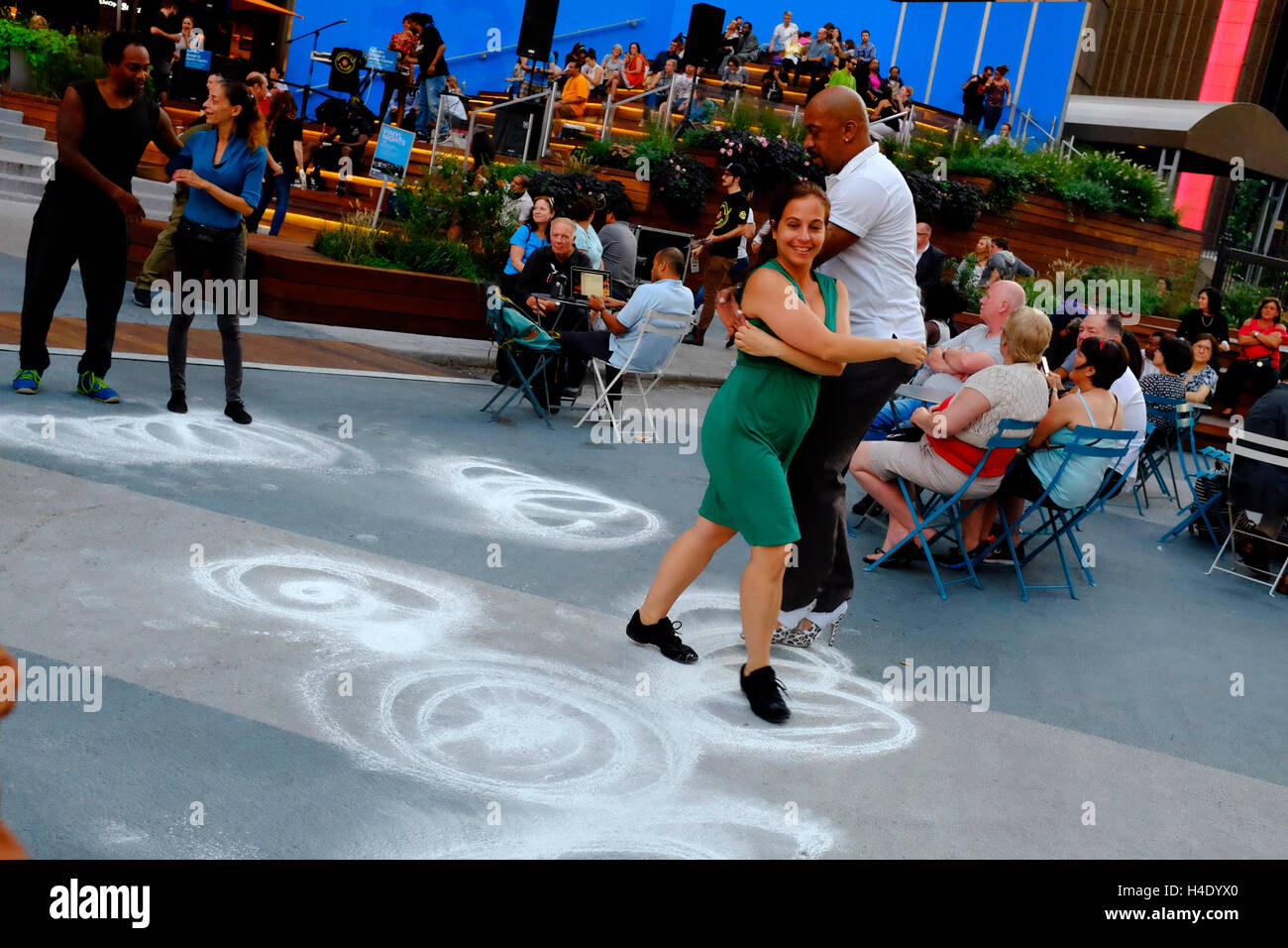 People dancing Salsa on the street next to Madison Square Garden ...