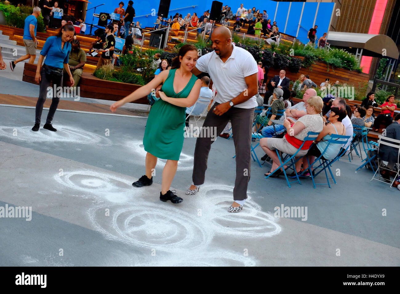 People dancing Salsa on the street next to Madison Square Garden ...