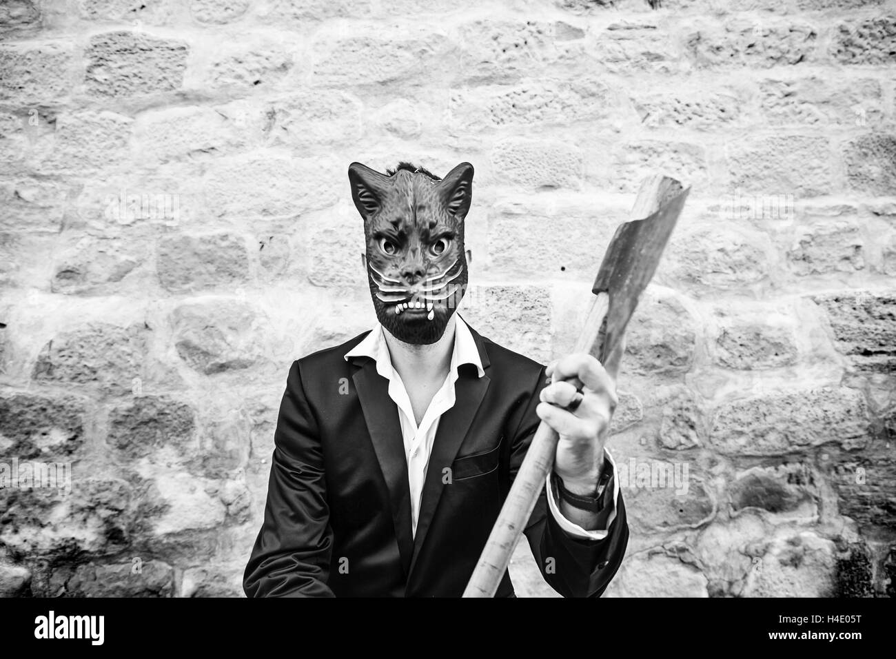 Murderers with masks and weapons, fear and violence Stock Photo - Alamy