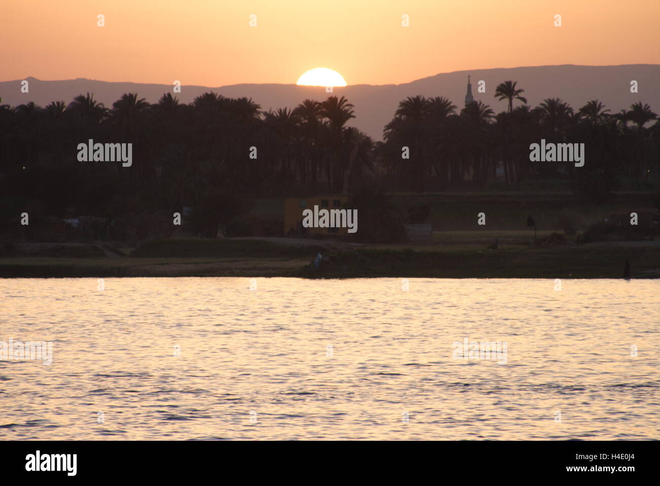 The Sunset on the river Nile showing the east bank Stock Photo - Alamy