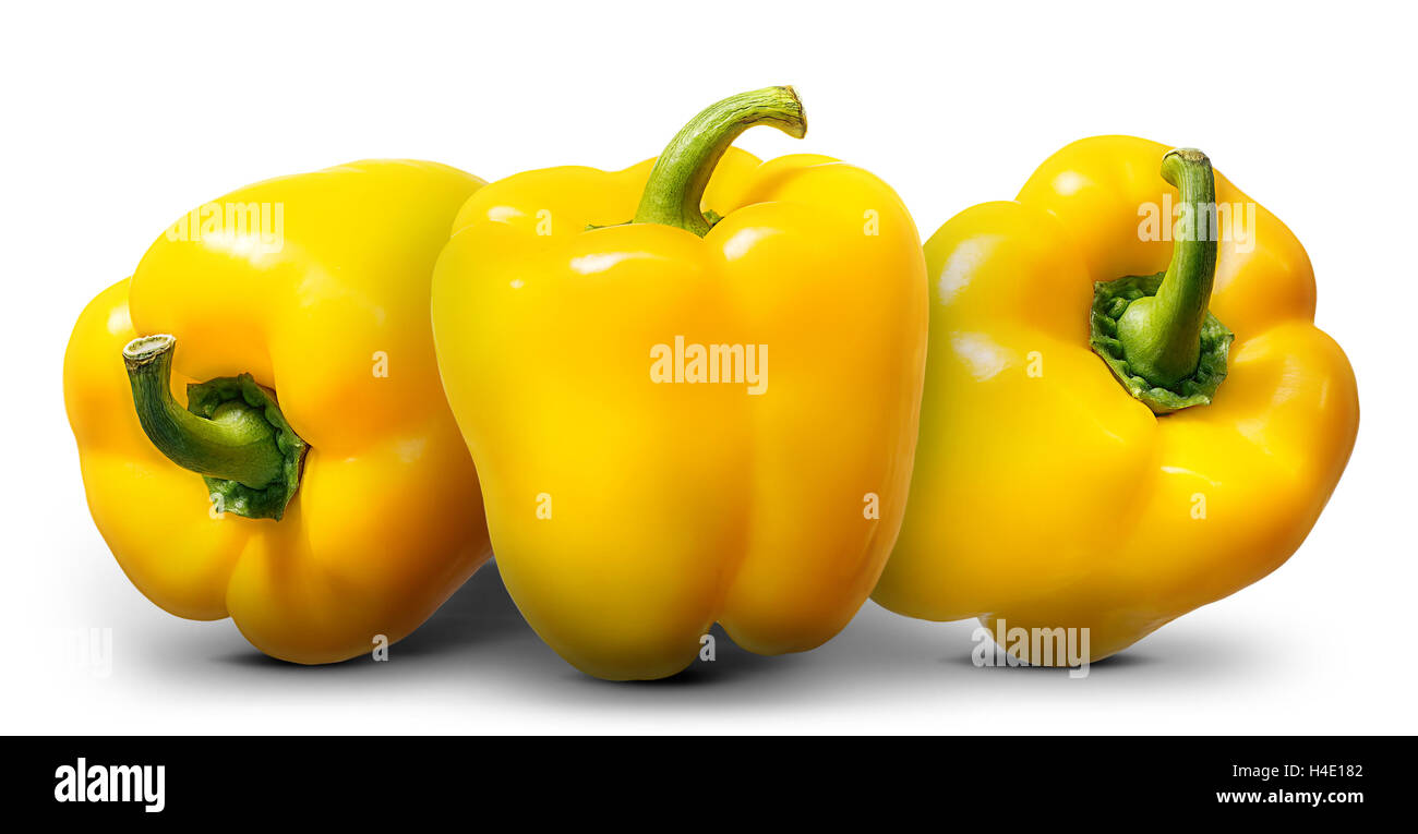 Group of yellow pepper isolated on white Stock Photo - Alamy
