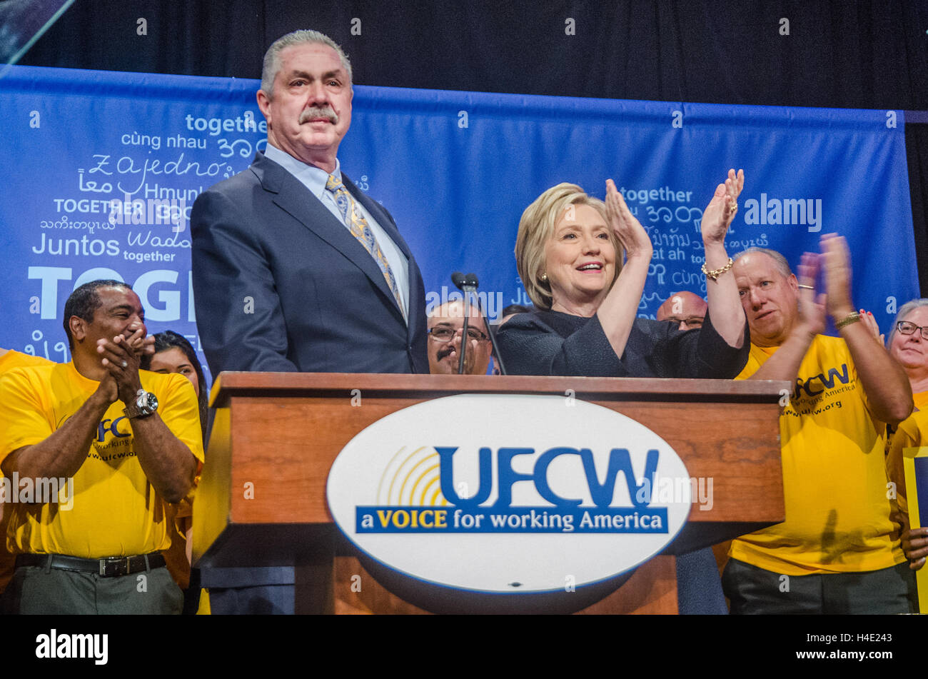 Marc Perrone (l) and Hillary Clinton addresses union workers at the ...