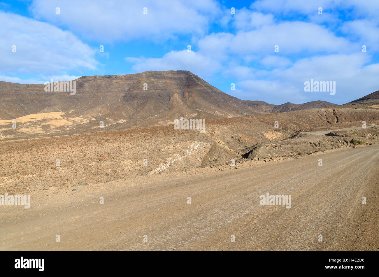 Unpaved road from Morro Jable town to Cofete beach, secluded area of ...