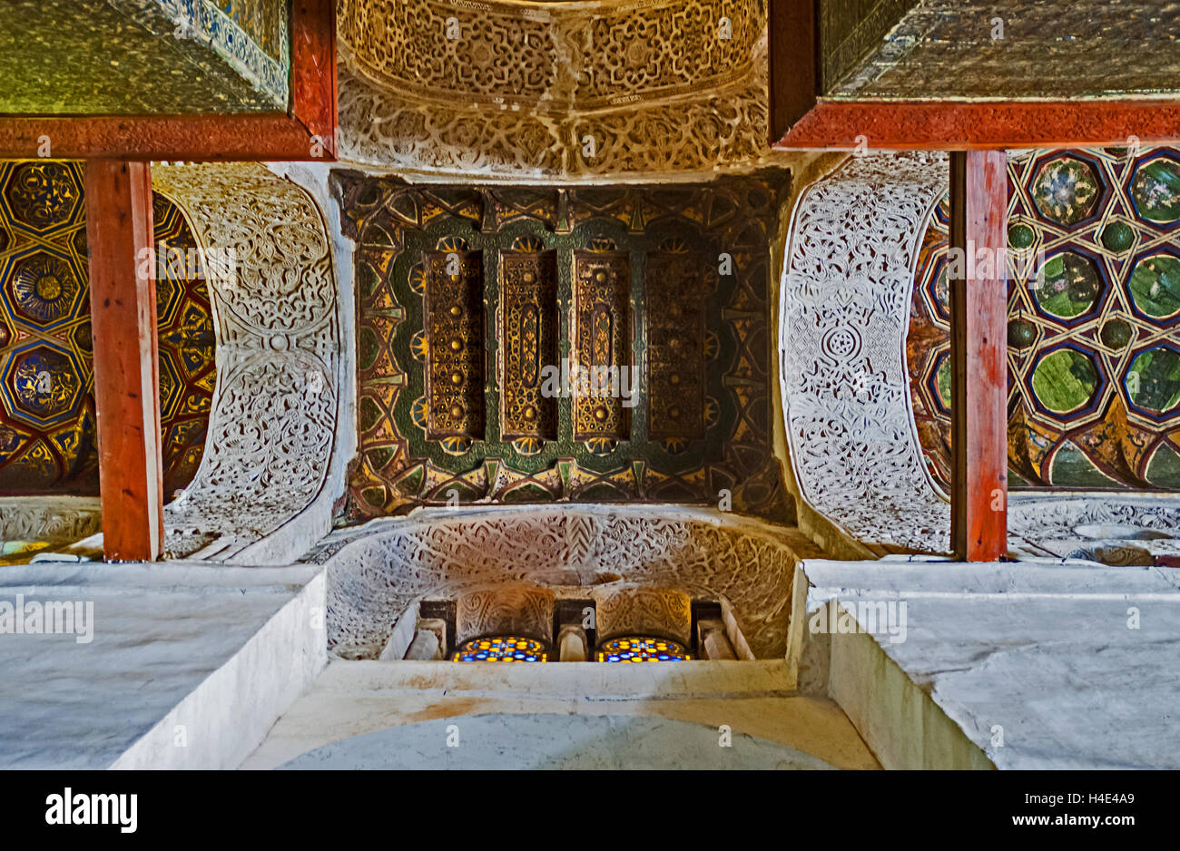 The carved stone and wooden islamic patterns on ceiling in Qalawun ...