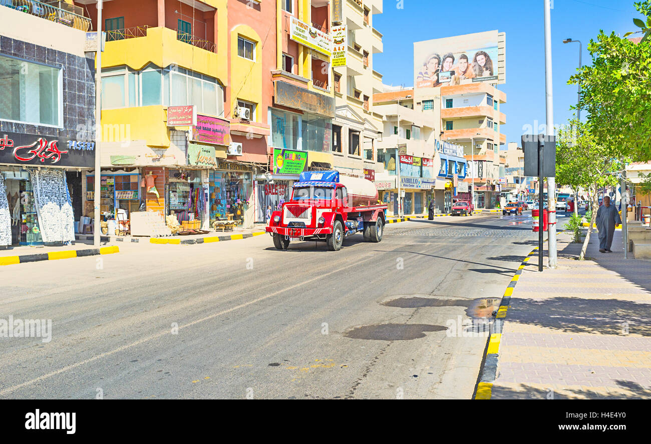 The wide street with many shops and cafes in the city centre Stock ...
