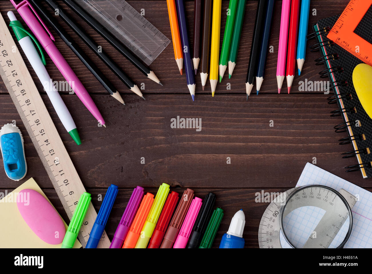 School supplies on a wooden table Stock Photo - Alamy