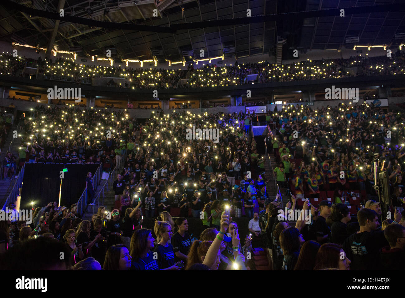 Crowd holding cell phone lights at WE Day Seattle in Key Arena Stock ...