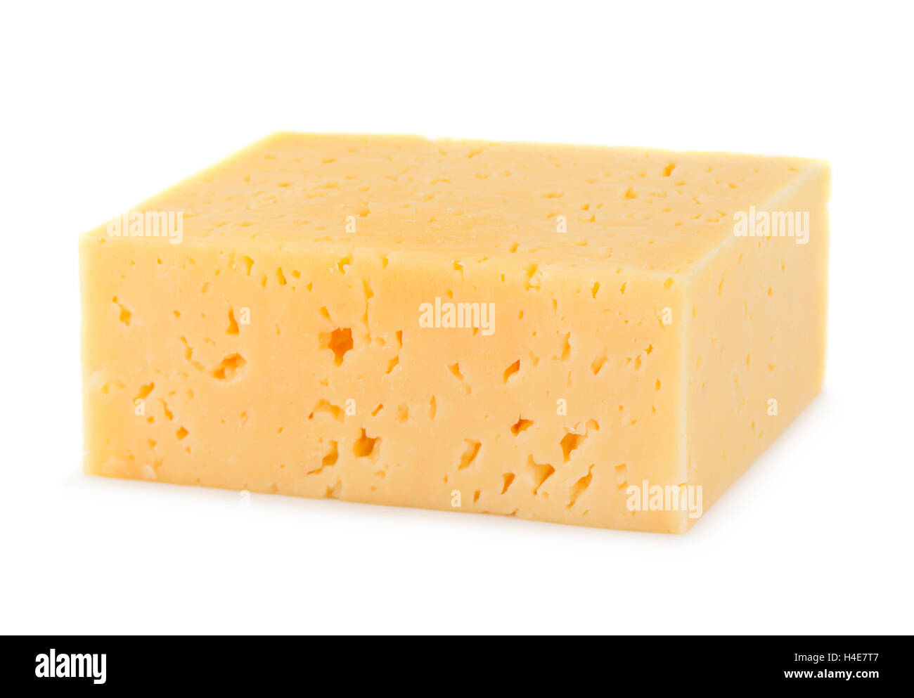 Chese block closeup isolated on white background Stock Photo - Alamy