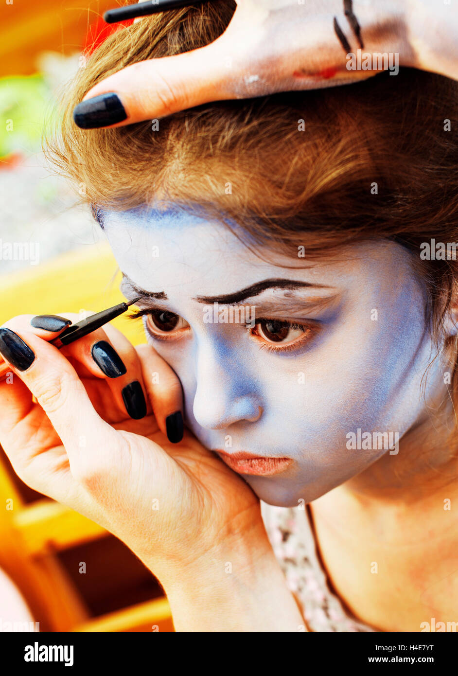 little cute child making facepaint on birthday party, zombie Apo Stock ...