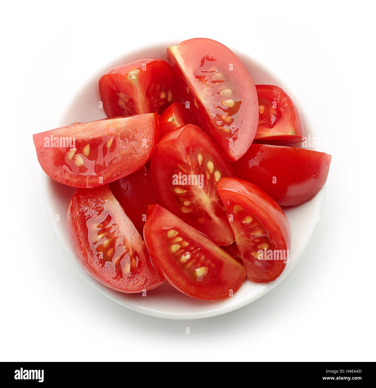 Bowl of fresh cherry tomato lobes isolated on white background, top ...