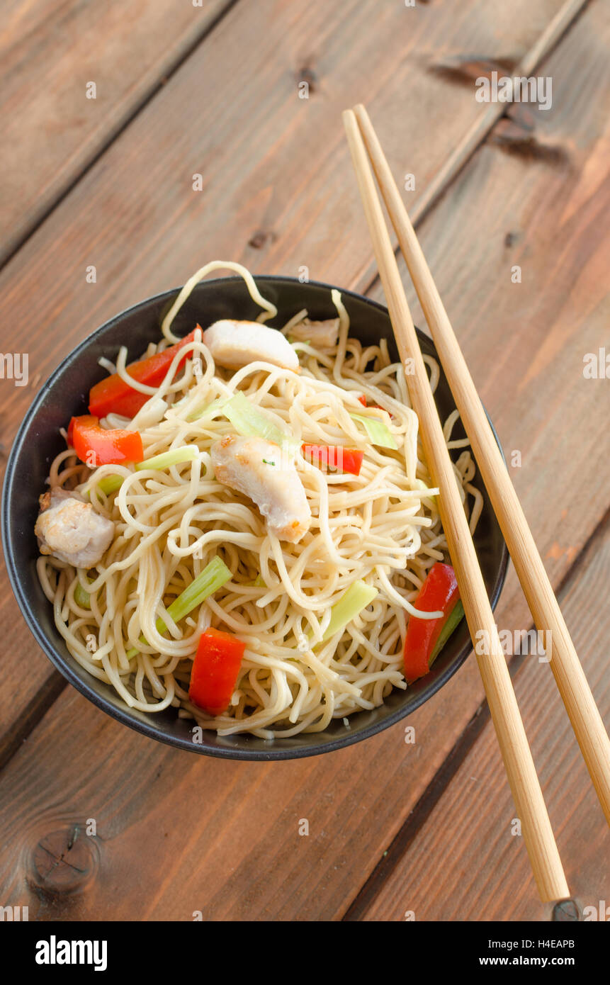 Chinese noodles, fast but delicious food with chopsticks Stock Photo ...