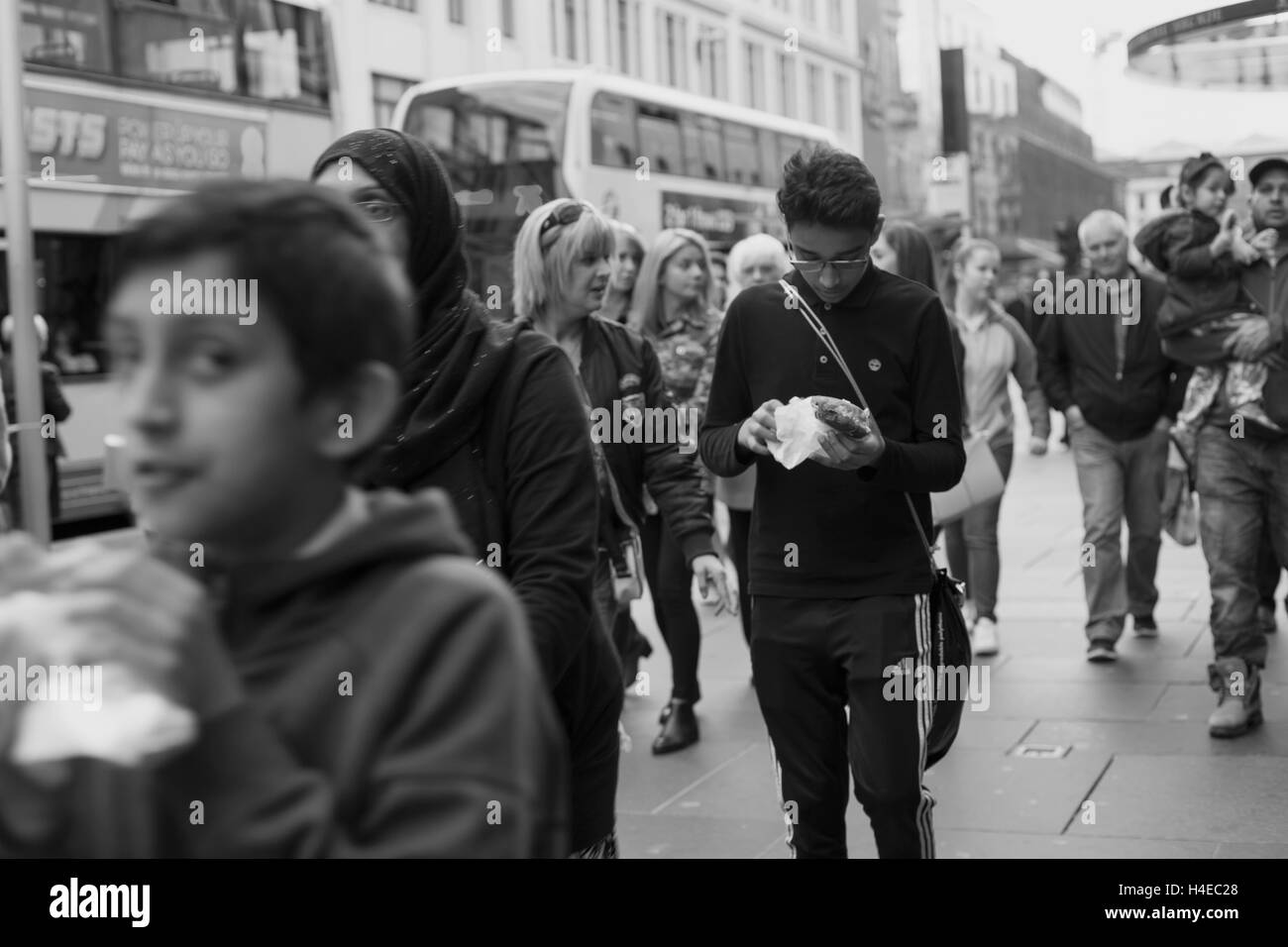 Man eating chips Black and White Stock Photos & Images - Alamy