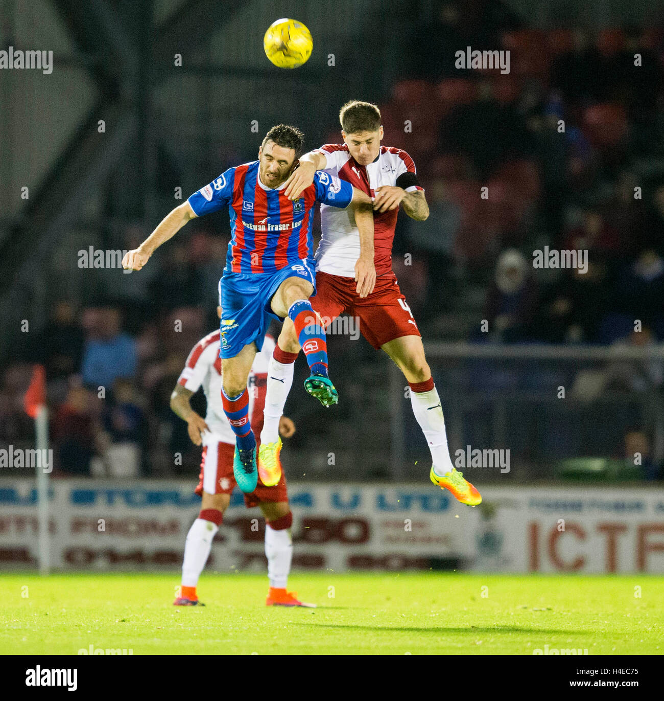 Inverness' Ross Draper(left) and Rangers' Clint Hill (right) battle for ...