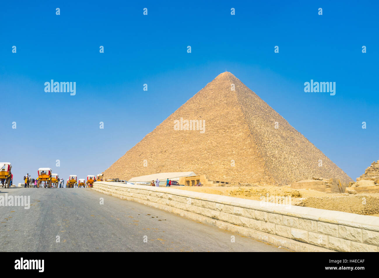 The modern road leads to the Great Pyramids, so tourists can walk by ...