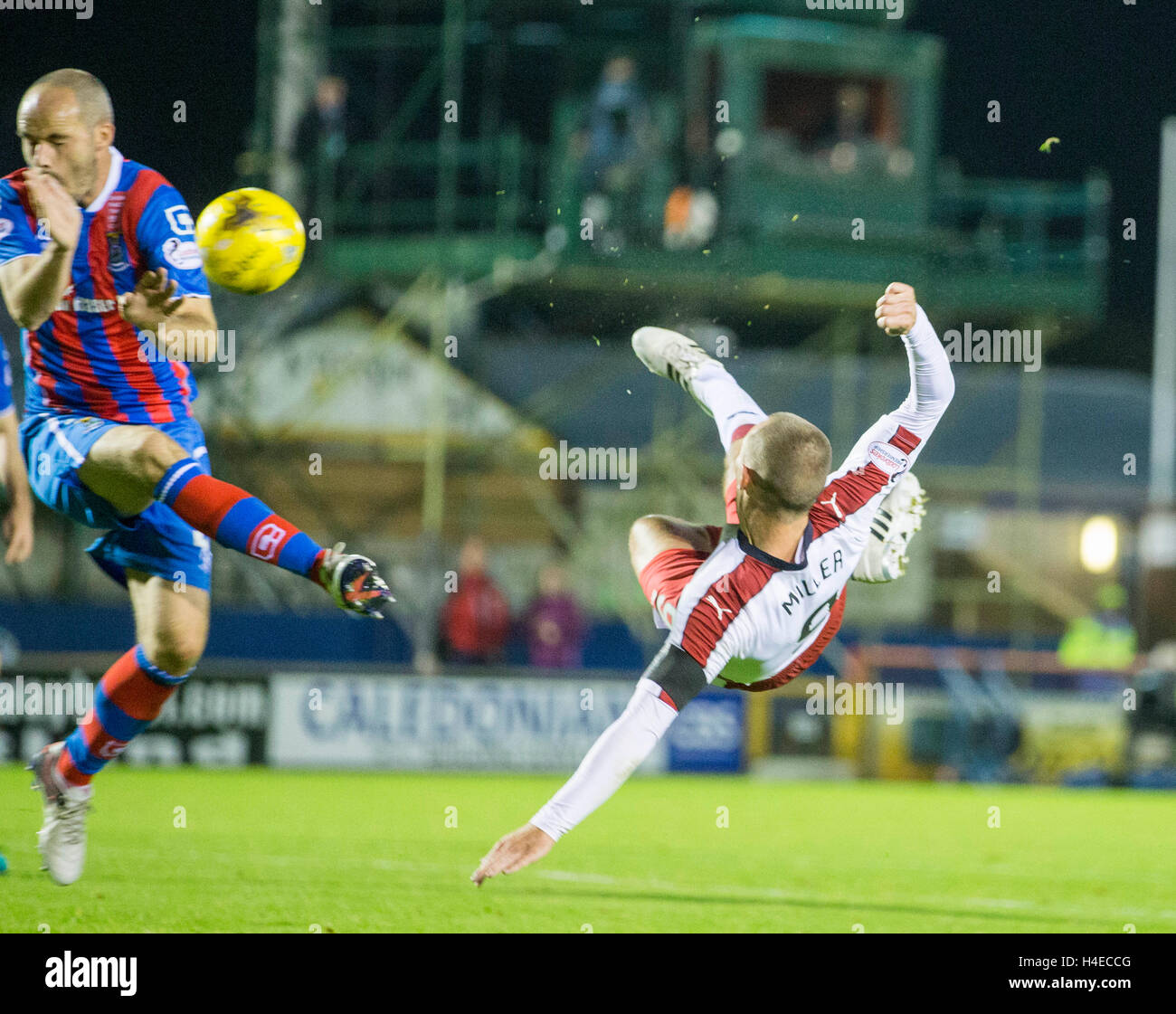 Rangers' Kenny Miller has a shot past Inverness' David Raven (left ...