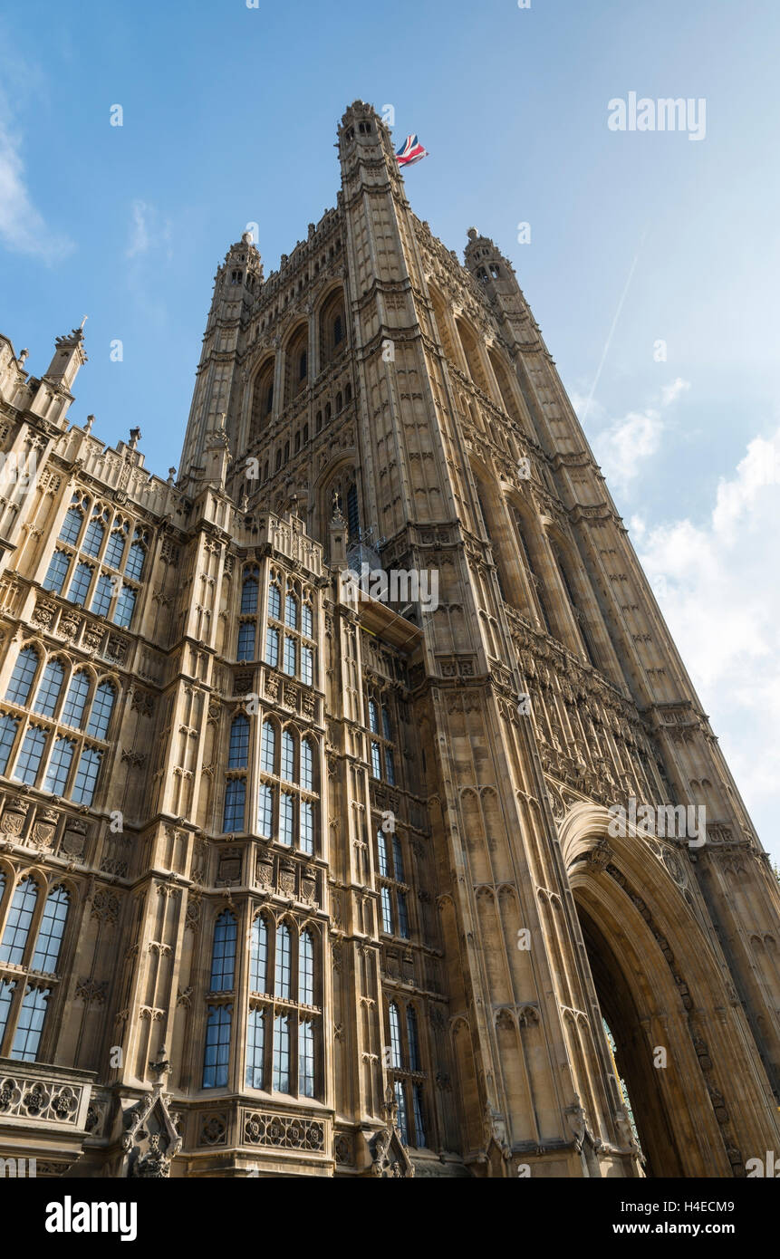 Looking upwards at the architecture of the Victoria Tower at the Palace of Westminster / Houses ...