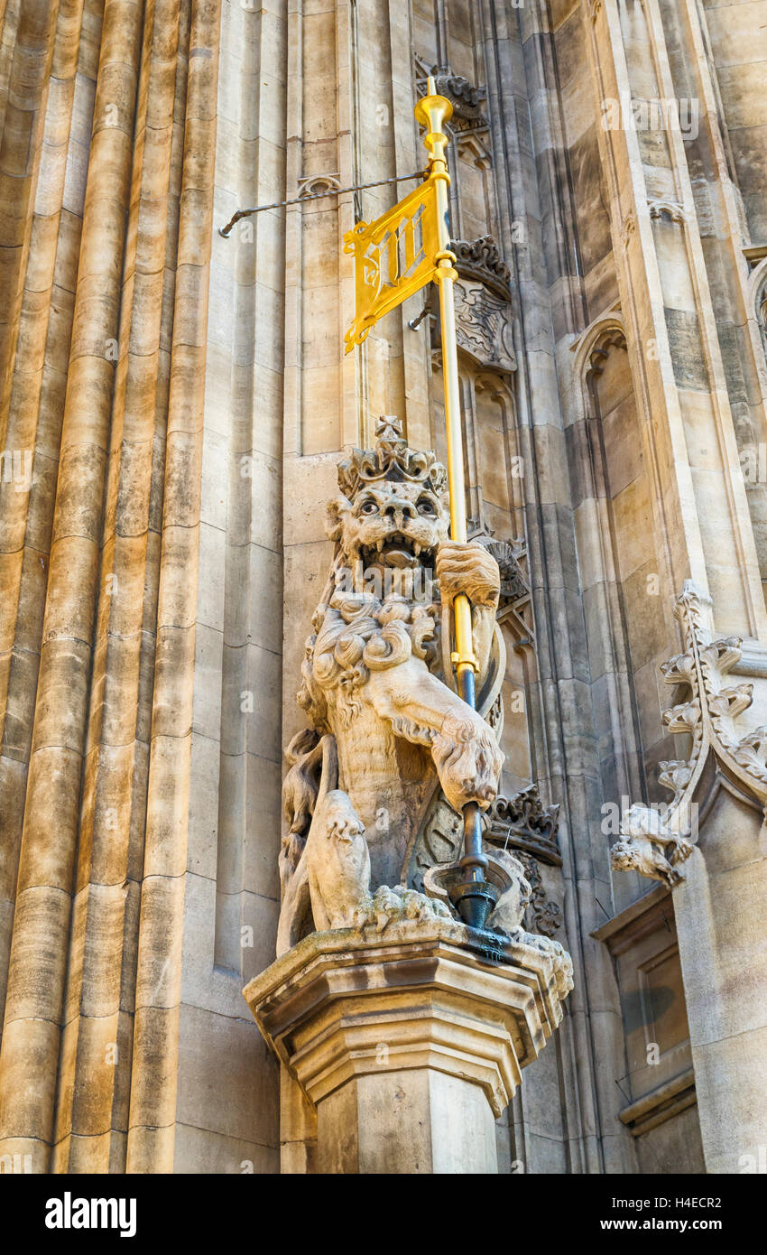Close up of statue of lion holding golden key or flag with VR at the ...