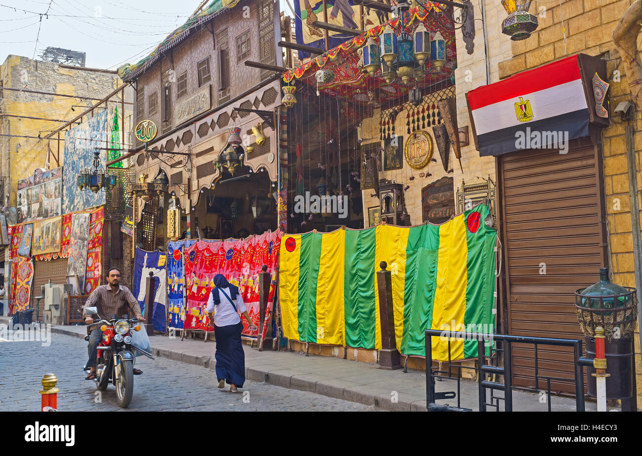 The market stalls before the opening are covered with colorfull cloth ...