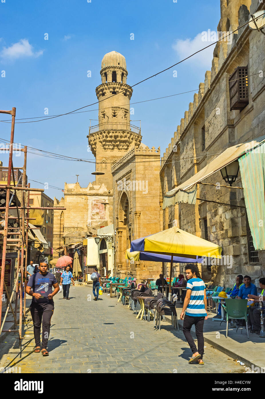The outdoor teahouse located in shade at the old Mosque's wall, Cairo ...