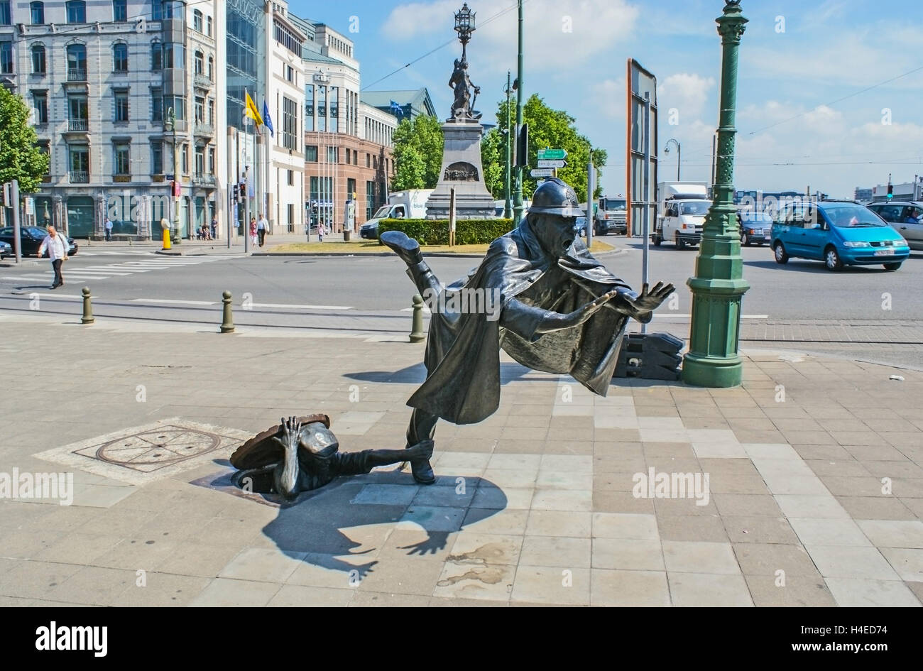 Tom Frantzen’s sculpture depicts a policeman about to fall head over ...