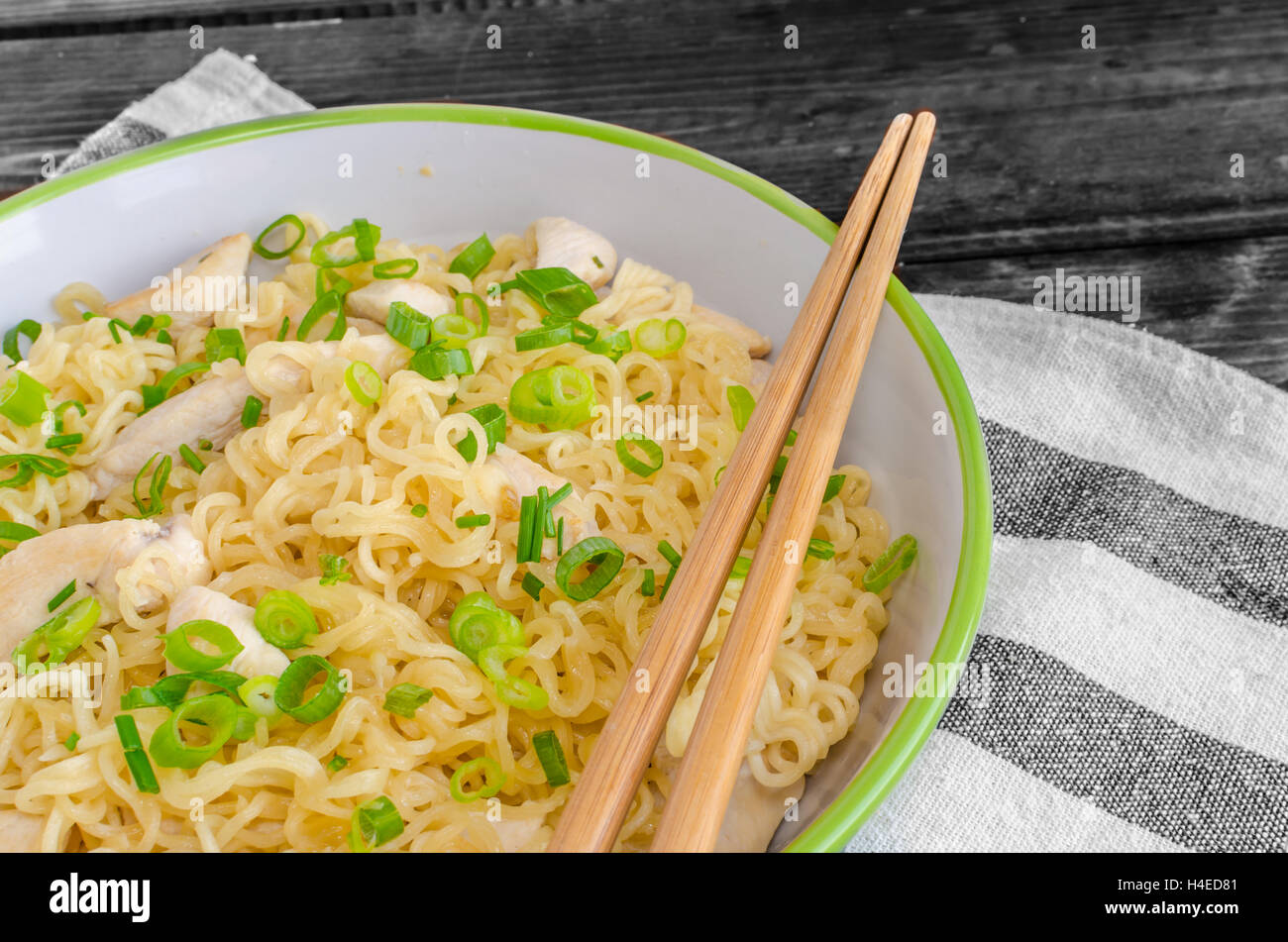 Chinese noodles, fast but delicious food with chopsticks Stock Photo ...