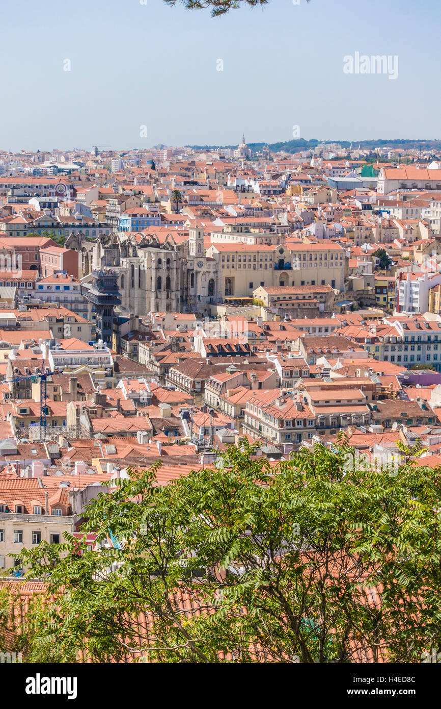 City view of Lisbon and the red tile roofs of the buildings from São ...