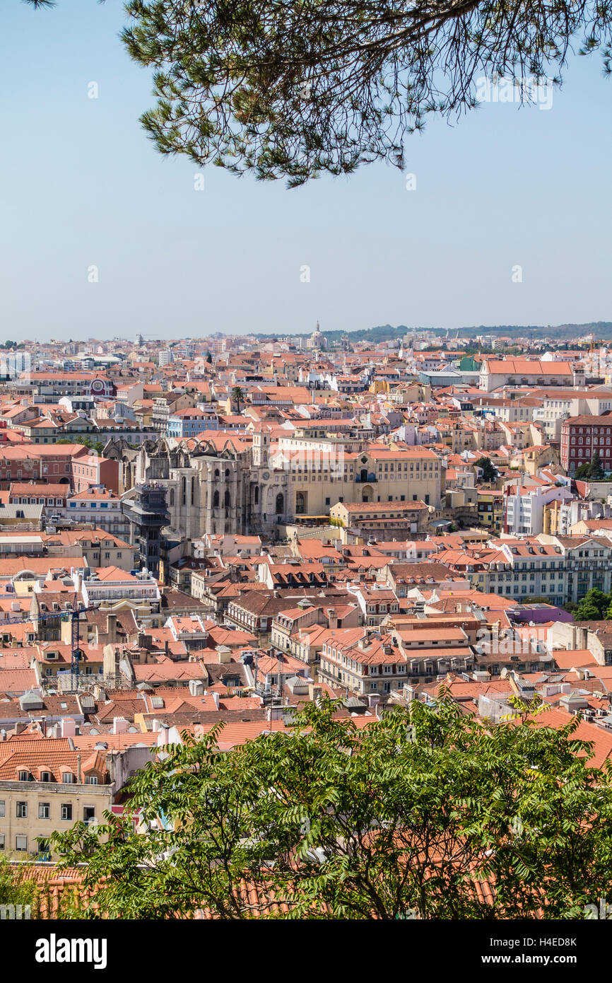 City view of Lisbon and the red tile roofs of the buildings from São ...