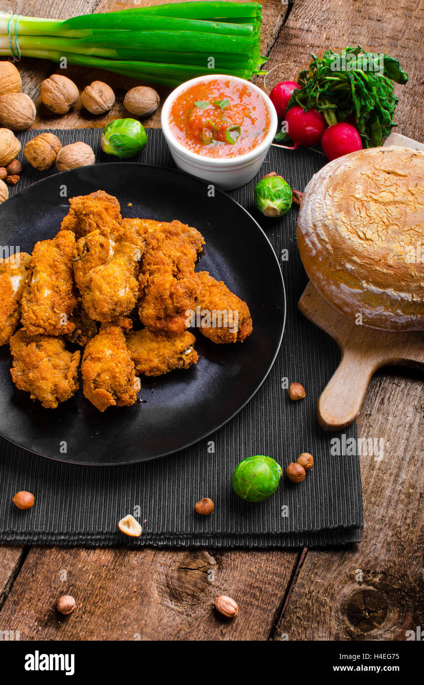 Spicy breaded chicken wings with homemade bread, all homemade Stock ...