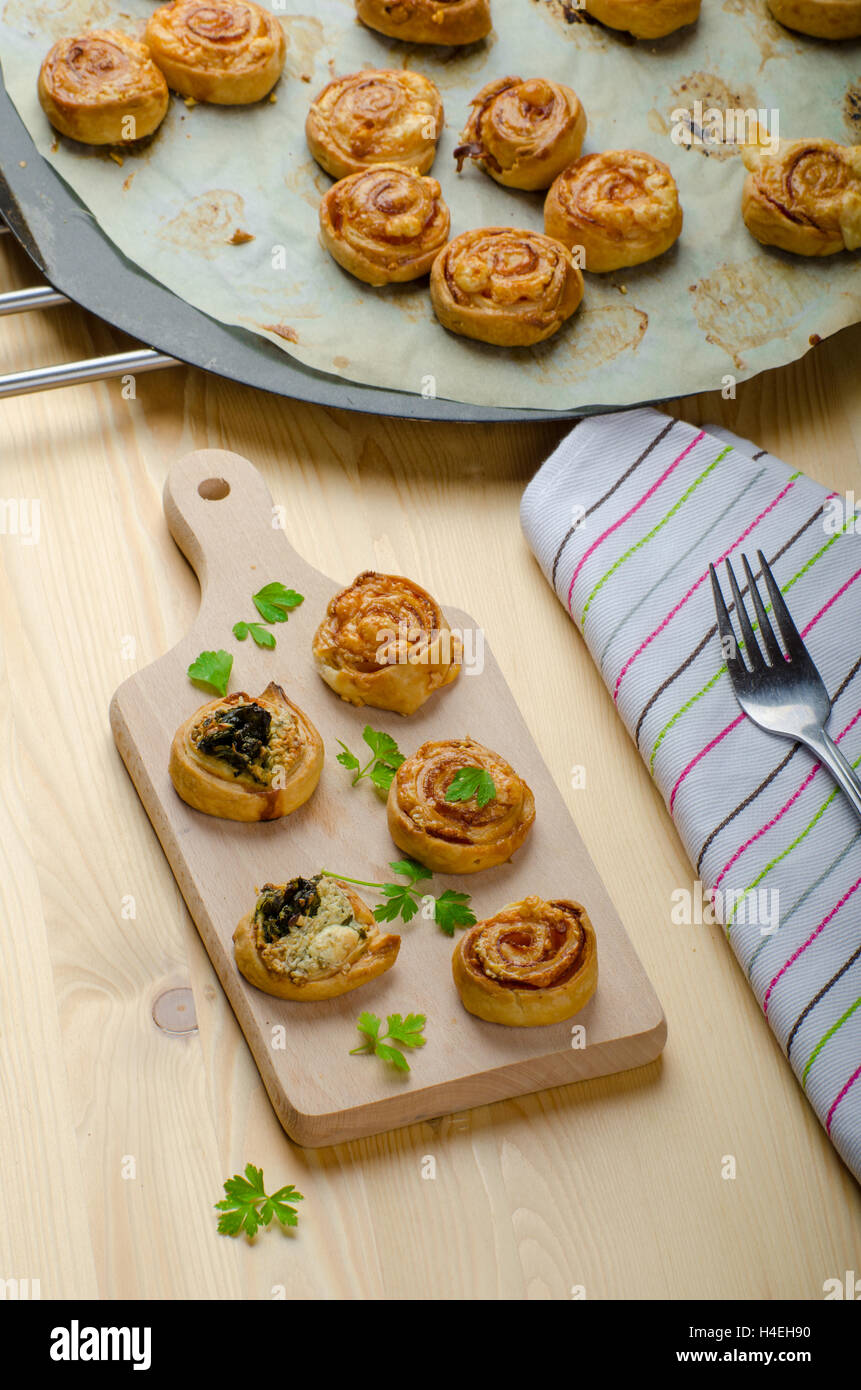 Canapés puff pastry with spinach, garlic blue cheese, easy snack Stock ...