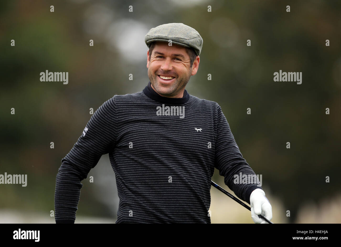 England's Robert Rock after teeing off on the 17th hole during day ...