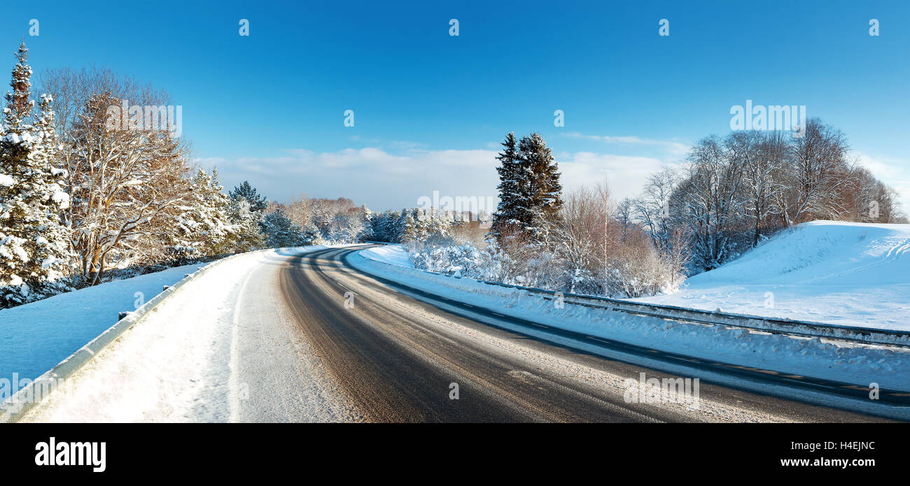 Asphalt road in snowy winter on beautiful sunny day Stock Photo - Alamy
