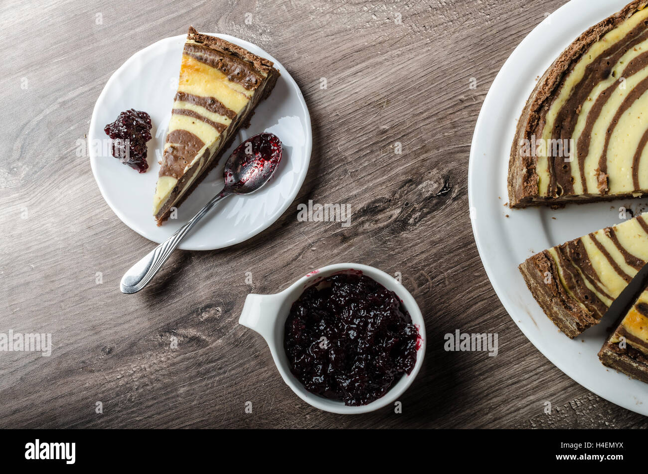 Two-tone cheesecake with homemade cherry jam, homamade Stock Photo - Alamy
